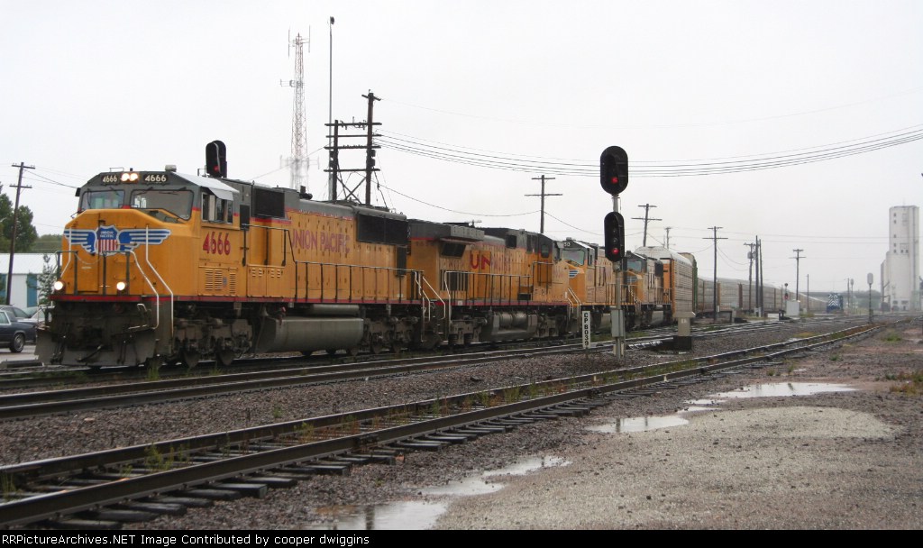 Autos accelerating toward North Platte in the pouring rain